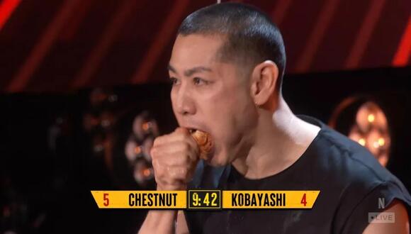 Joey Chestnut wins $100,000 after smashing world record with 83 hot ...