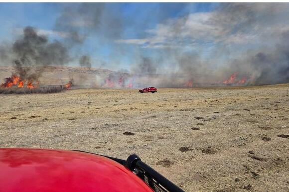 Firefighters battle a blaze along Happy Jack Road as concerns grow over ...