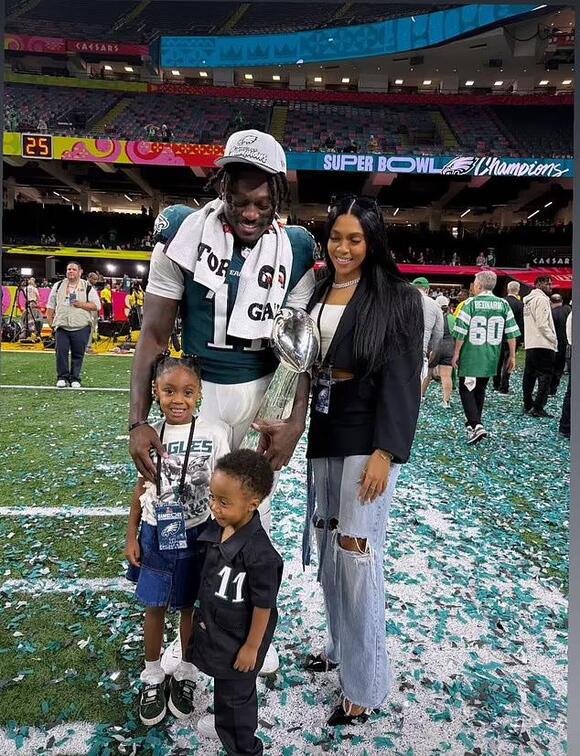 Philadelphia Eagles WAGs go wild with their men on the field after ...