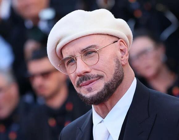 Staying Alive: John Travolta Debuts New Look With Kangol Hat At Cannes ...