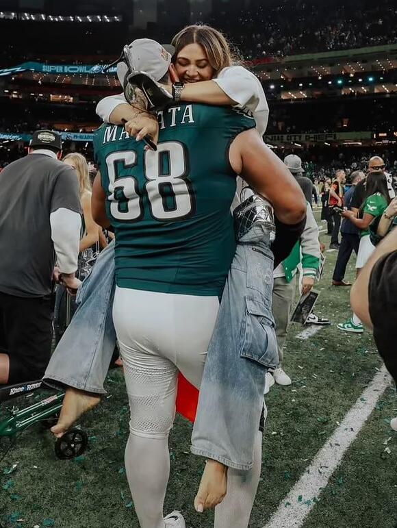 Philadelphia Eagles WAGs go wild with their men on the field after ...
