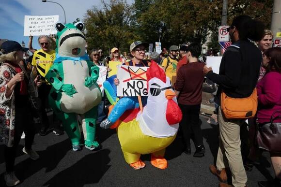 Why people are really wearing silly costumes at protests against Trump ...