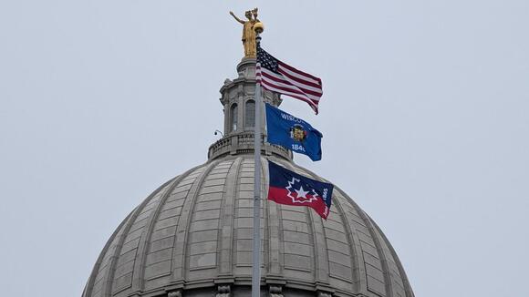 Evers raises Juneteenth flag over Wisconsin Capitol, honors the late ...