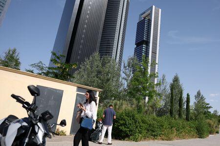 Madrid skyscraper fire is under control, police say - NewsBreak