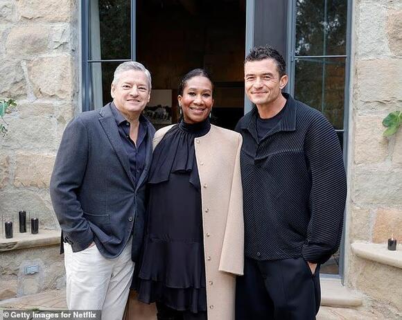Meghan holds hands with Netflix boss Ted Sarandos' wife as the Sussexes ...