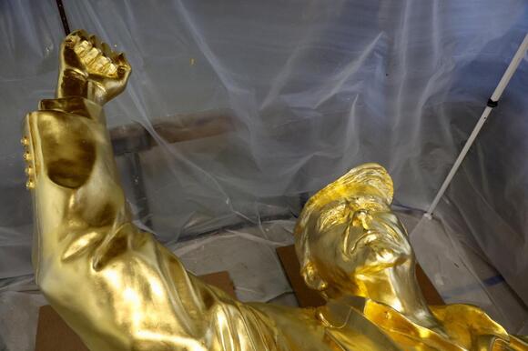 MAGA Pastor Defends Bizarre Golden Trump Statue - NewsBreak