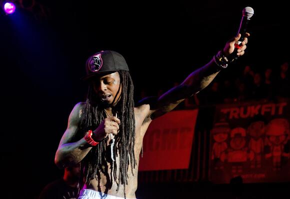 T.I. Denies Lil Wayne Influenced Him But Says They Do 'Push Each Other ...