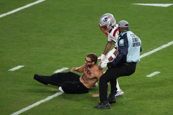 Super Bowl LX Streaker Hit With Multiple Charges After Halting Play ...