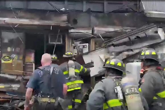 Three NYC firefighters wounded after metal shop awnings fall and crush ...