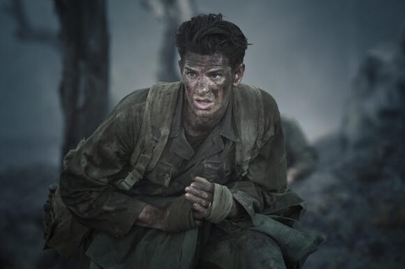 Refusing to carry a weapon because of his religious beliefs, army medic ...