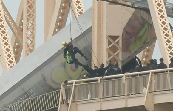 Driver pulled from truck dangling from Louisville bridge over Ohio ...