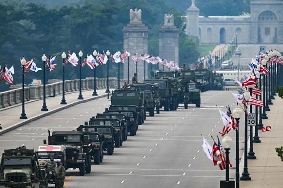 Trump's birthday military parade in pictures: Soldiers march and tanks ...