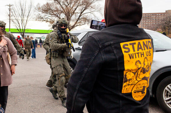 Dozens of federal agents raid St. Paul business, sparking protest ...