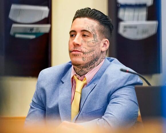 Accused double murderer allowed to cover swastika and skeleton face ...