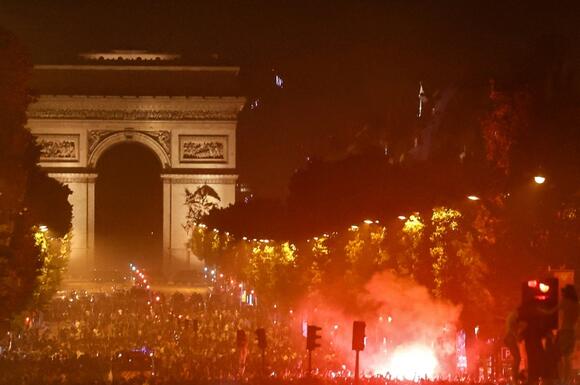 Paris celebrates football triumph amid riot recriminations - NewsBreak