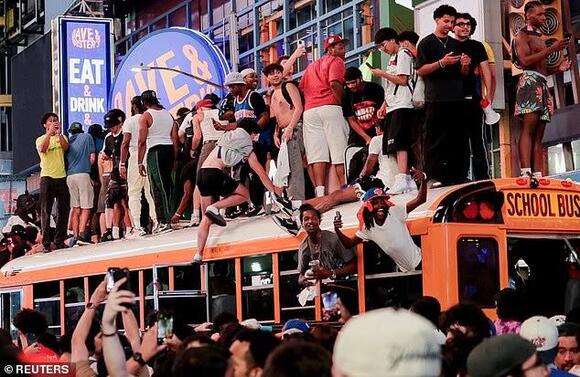 New York descends into CHAOS as fans jump on cop cars and buses after ...