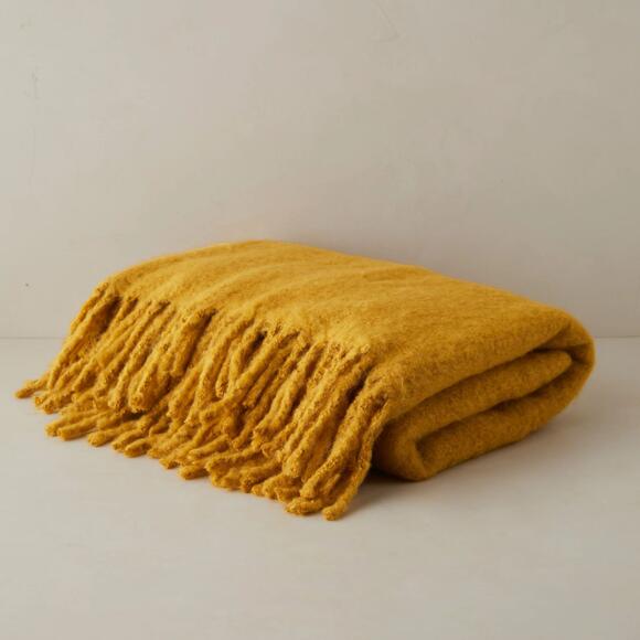 Hilary Duff's Mustard Sofa Pioneers An Unexpected 2026 Color Trend (And ...