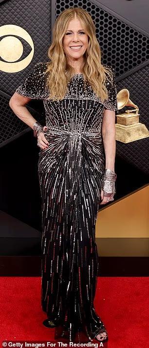 Rita Wilson poses with rarely seen granddaughter Olivia Hanks, 15, at ...