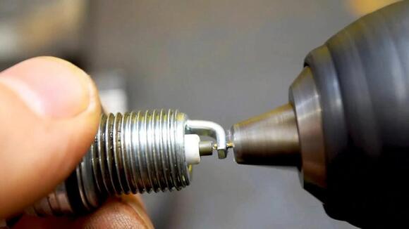 Why Some Drivers Drill Holes in Spark Plugs — and Why It’s Usually a ...
