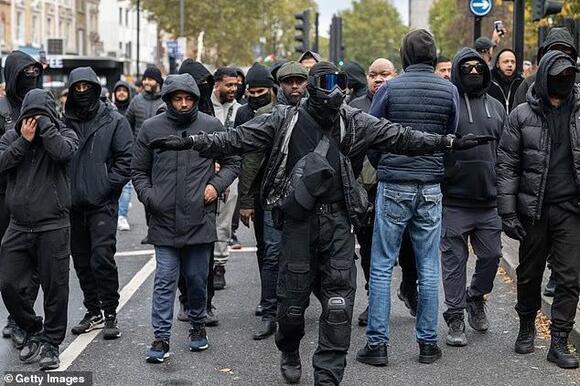 Police arrest left-wing protesters as they defy police ban to confront ...