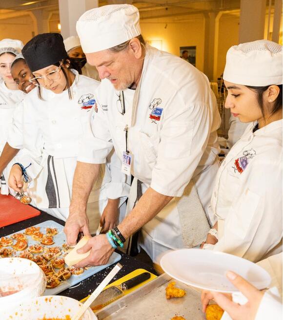 Chef turned police officer aims 'to build strong children' through ...