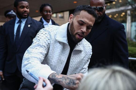 Chris Brown Rocks Graduation Regalia After Receiving Honorary Doctorate ...