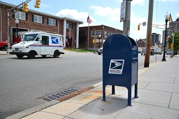 Ex-USPS worker in NJ admits to stealing valuable trading cards, sports ...