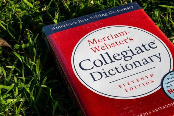 Merriam-Webster's dictionary names its 2025 word of the year - NewsBreak