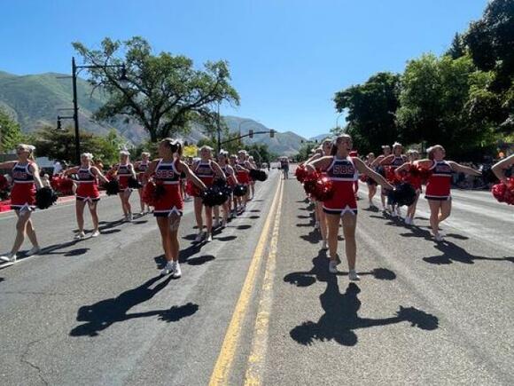 Springville High School cheer team shines at Art City Day parade ...