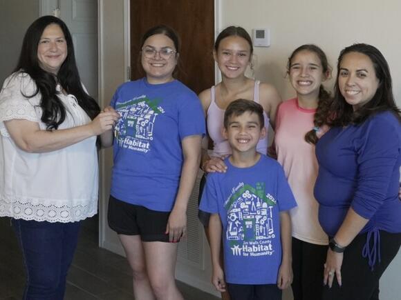 Alice family receives keys to their new home - NewsBreak