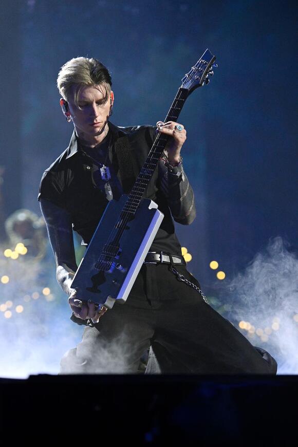 MGK Explained Why He Literally Covered His Entire Body With A Giant ...