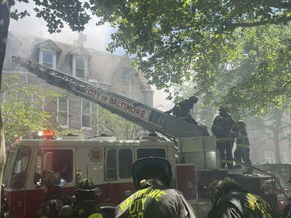 Woman found dead, firefighter injured in 3-alarm rowhome fire - NewsBreak