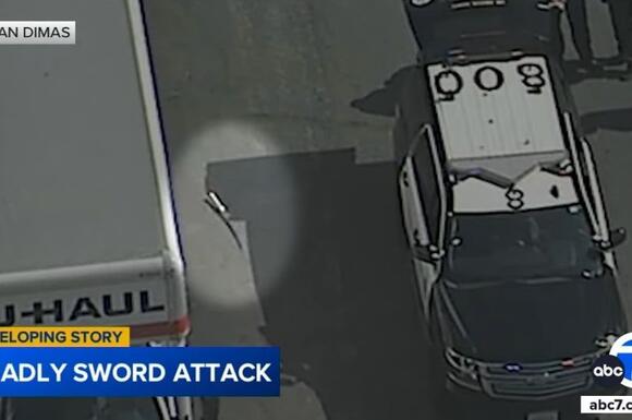 Chilling footage shows woman carrying samurai sword after woman stabbed ...