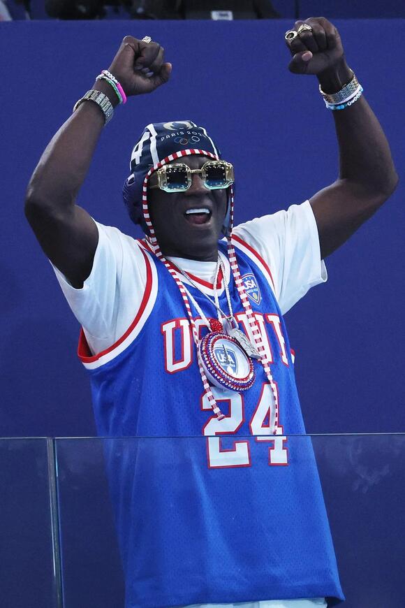 Flavor Flav unveils custom bronze clock he made for Jordan Chiles amid ...