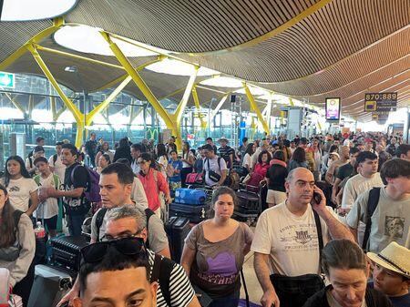 Global cyber outage hits air travel, leaving passengers in limbo ...