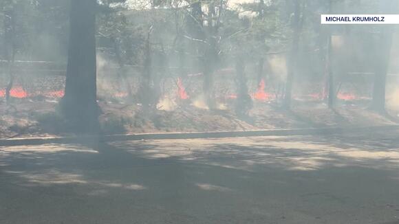 Blown transformer sparks brush fire along LIRR tracks in Garden City ...