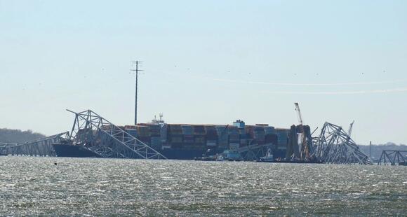 A channel has opened for vessels clearing wreckage from Key Bridge ...