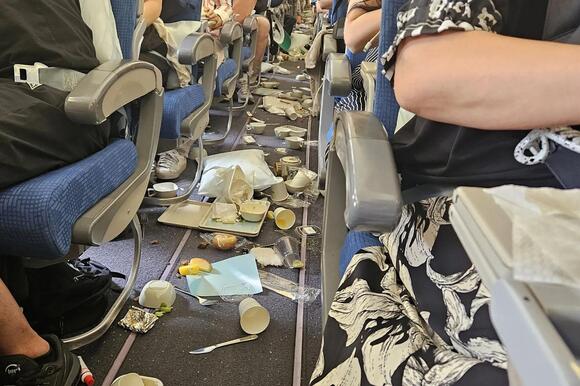 Over a dozen injured, meals thrown around cabin in horrifying scene ...