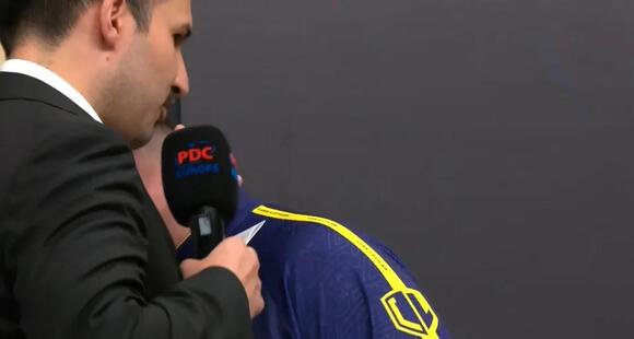 Tearful Luke Littler consoled by announcer and Peter Wright after ...