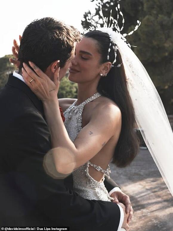Dua Lipa stuns in a Chanel gown as she shares the first photos from ...