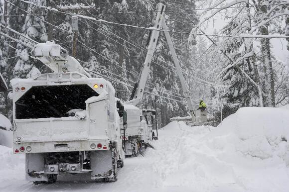 A massive blizzard howls in the Sierra Nevada. High winds and heavy ...