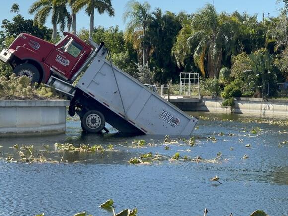 'YOU DON'T SEE THIS EVERYDAY': Construction truck falls into Cape Coral ...