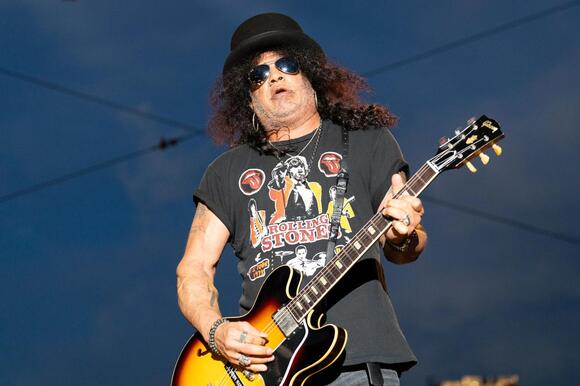 Slash returns to performing after death of stepdaughter Lucy-Bleu ...