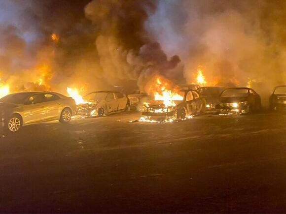 Dozens of vehicles damaged or destroyed in car lot fire west of Jupiter