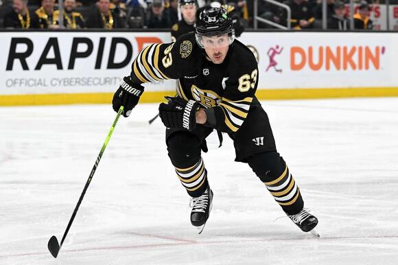 Brad Marchand injured on questionable hit by Sam Bennett in Bruins ...