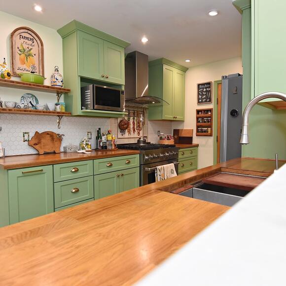 They Removed the White Builder-Grade Kitchen and Rebuilt It Around Sage ...