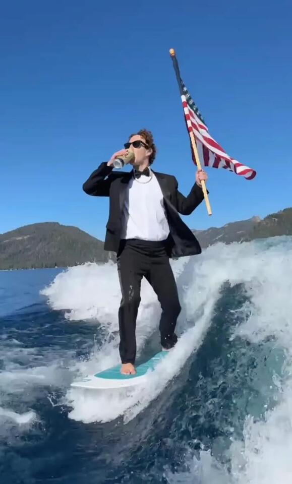 Mark Zuckerberg dons tux in July 4 surfing video while holding beer and ...