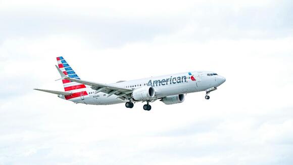 AI now helps American Airlines hold planes so late passengers still ...
