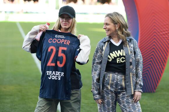 Nearly 100 former Boston U soccer players unite in support of coach ...