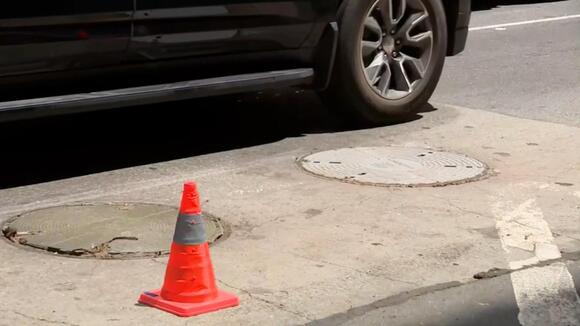 Woman dies after falling into New York City manhole - NewsBreak